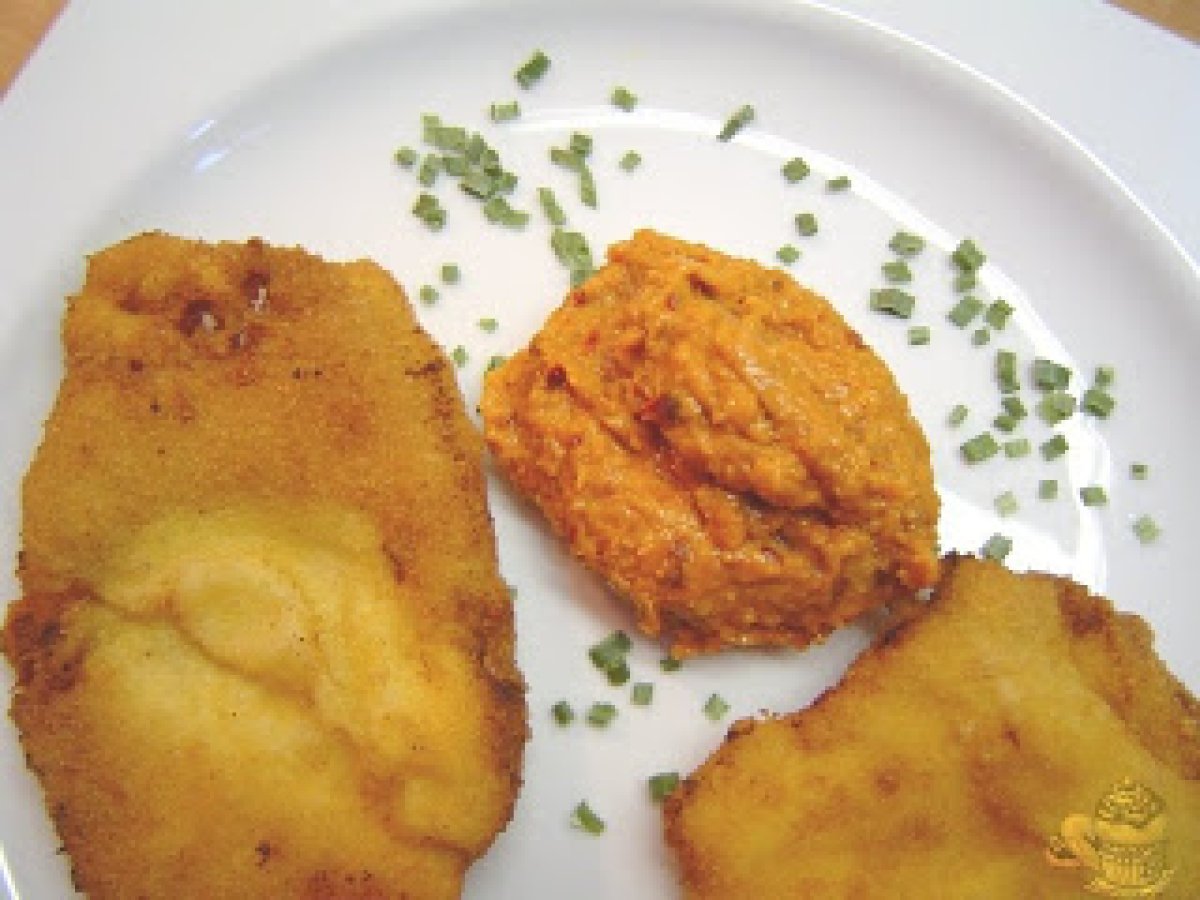 Filetes de pollo villeroi con salsa romesco - Receta Petitchef