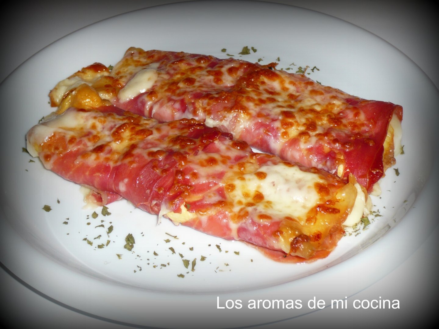 Rollitos de tortilla con queso y jamón: receta fácil