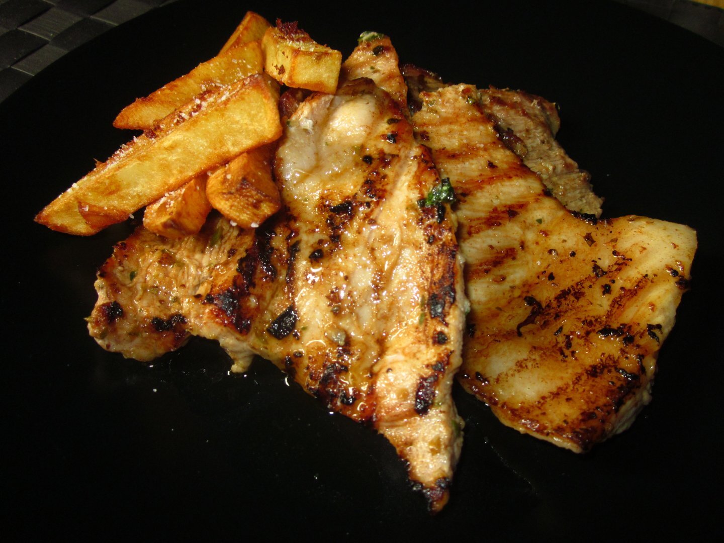 Receta de secreto adobado con patatas fritas